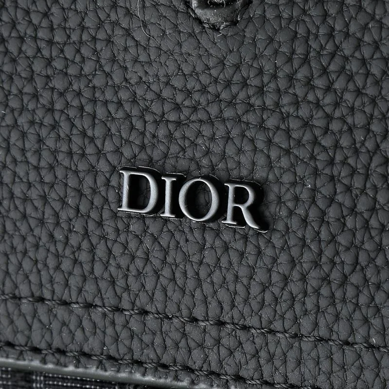 Indistinguishable Christian Dior Backpacks