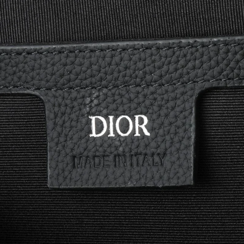 Indistinguishable Christian Dior Backpacks