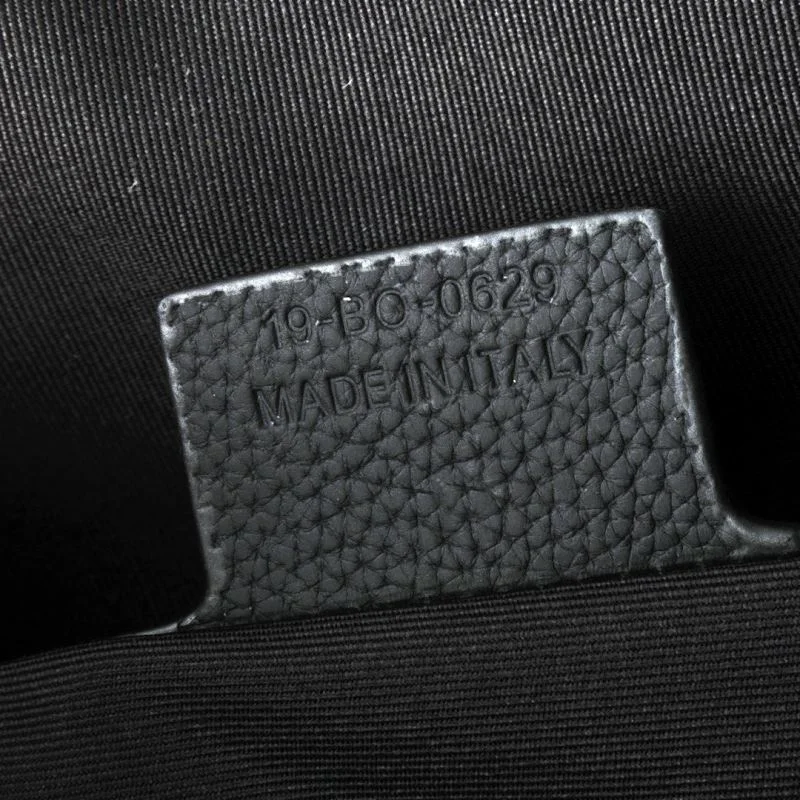Indistinguishable Christian Dior Backpacks