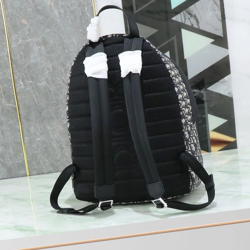 Indistinguishable Christian Dior Backpacks