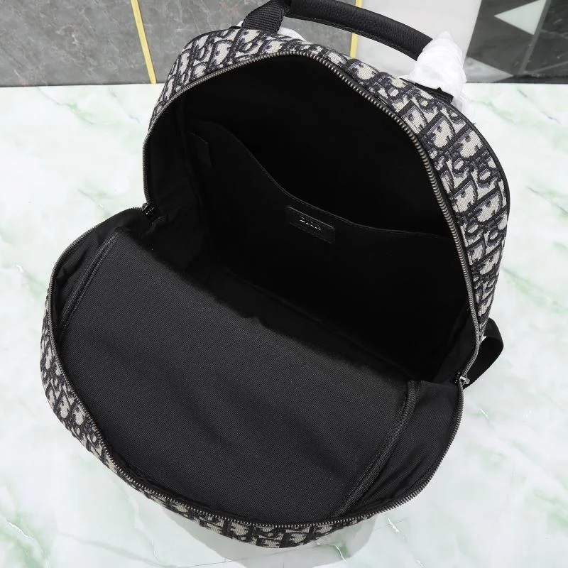 Indistinguishable Christian Dior Backpacks