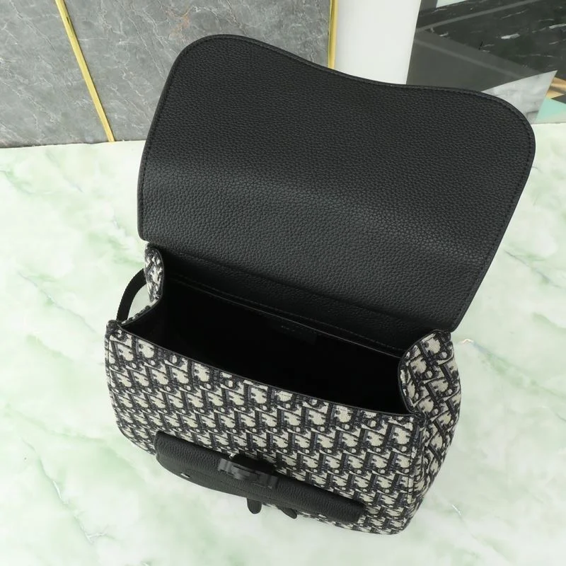 Indistinguishable Christian Dior Backpacks