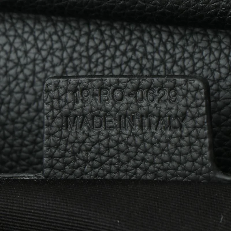 Indistinguishable Christian Dior Backpacks