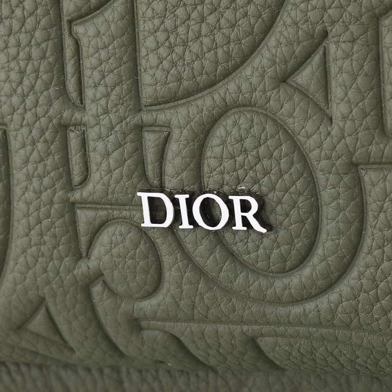 Indistinguishable Christian Dior Backpacks