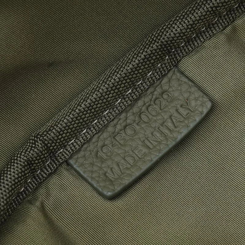 Indistinguishable Christian Dior Backpacks