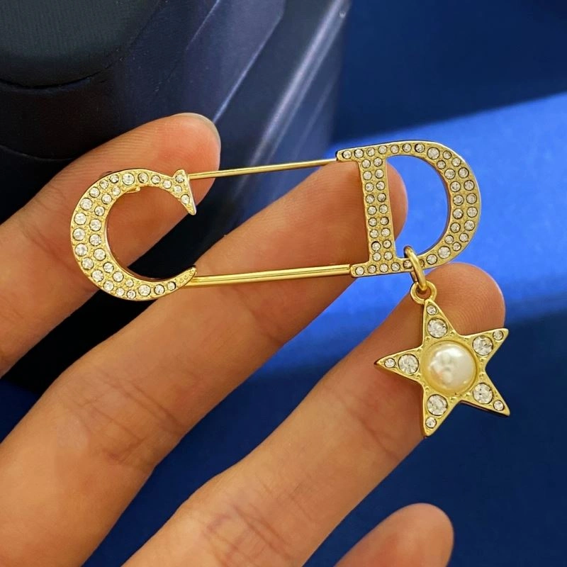 Indistinguishable Christian Dior Brooches