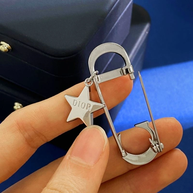 Indistinguishable Christian Dior Brooches