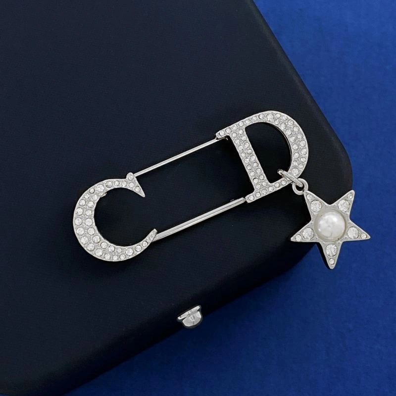 Indistinguishable Christian Dior Brooches