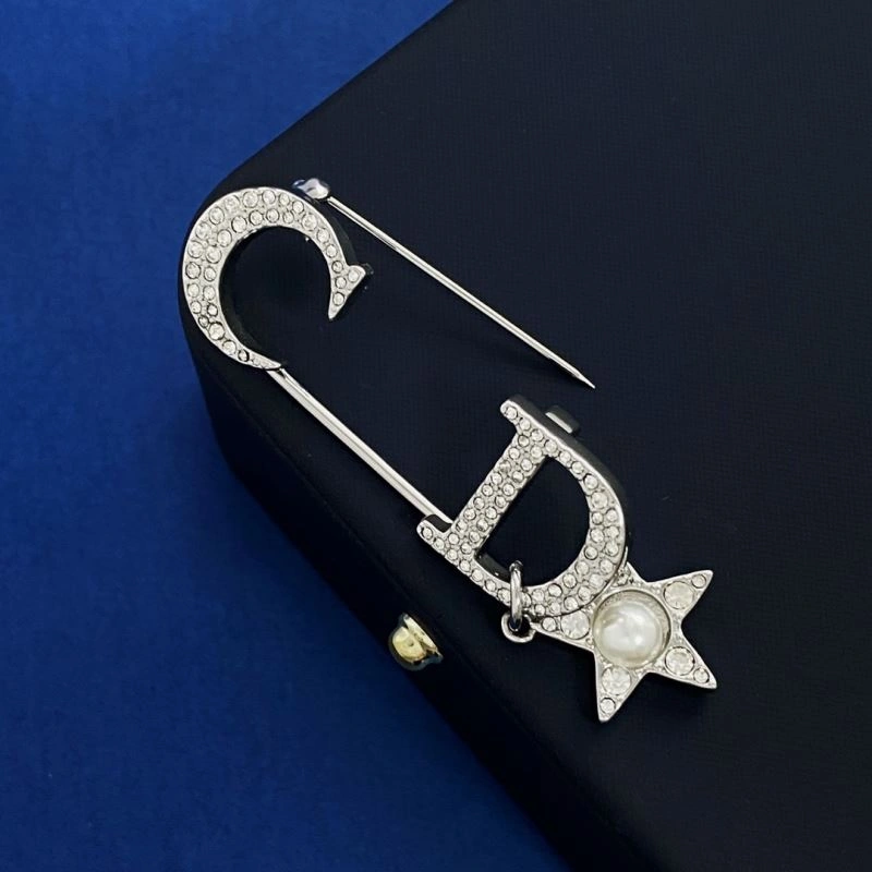 Indistinguishable Christian Dior Brooches