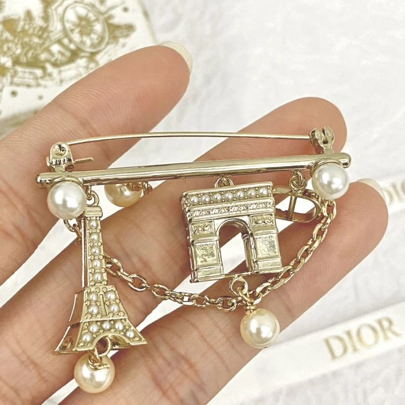 Indistinguishable Christian Dior Brooches