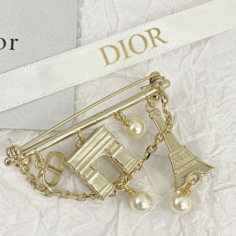 Indistinguishable Christian Dior Brooches