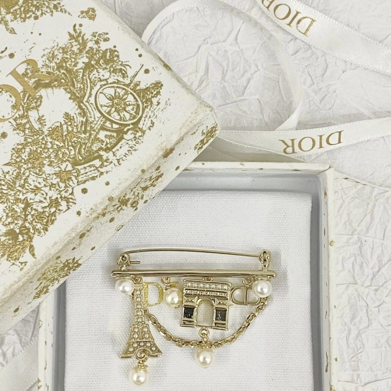 Indistinguishable Christian Dior Brooches
