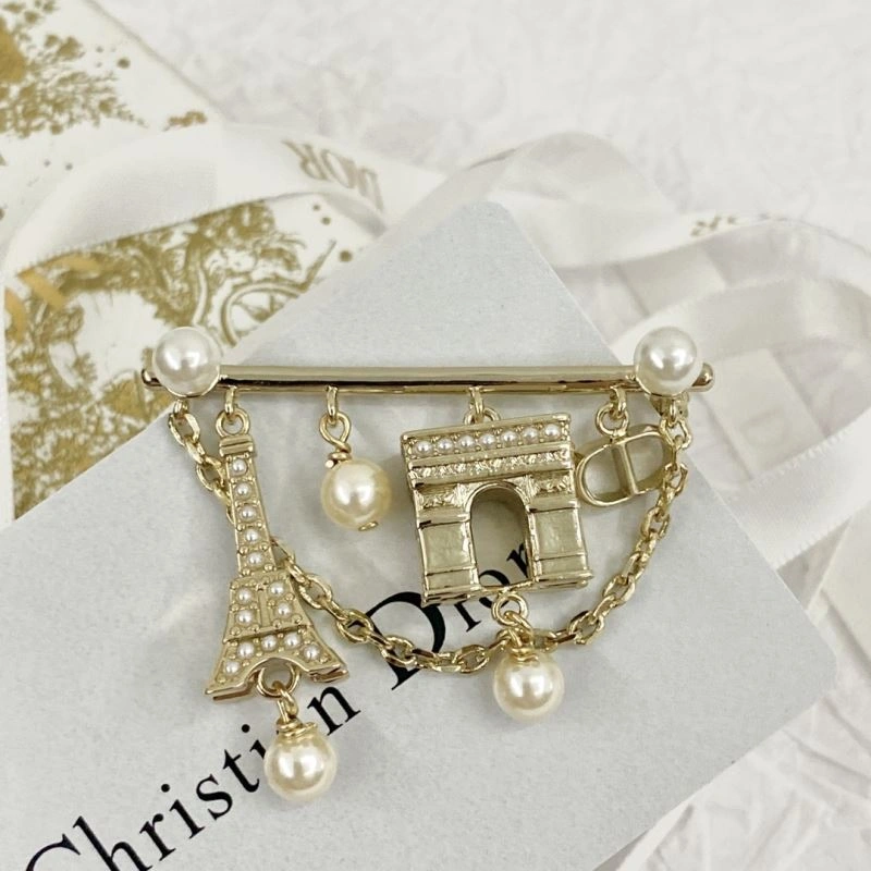 Indistinguishable Christian Dior Brooches