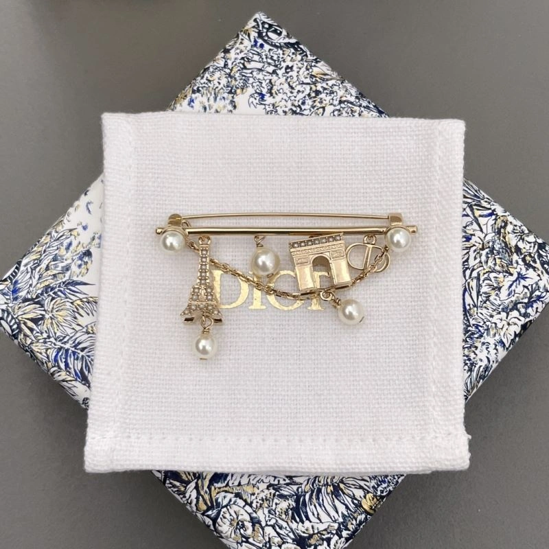 Indistinguishable Christian Dior Brooches