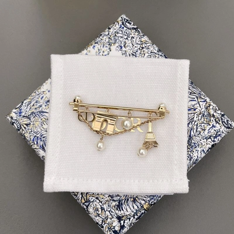 Indistinguishable Christian Dior Brooches