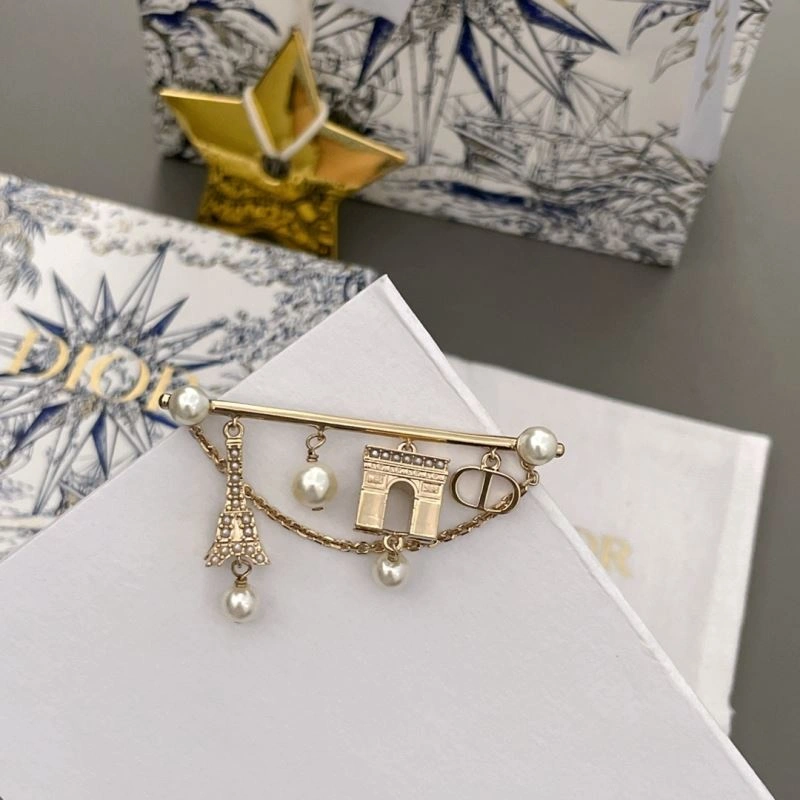 Indistinguishable Christian Dior Brooches