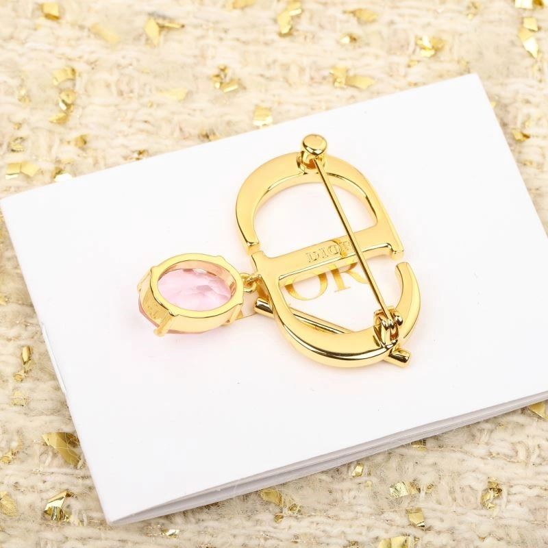 Indistinguishable Christian Dior Brooches