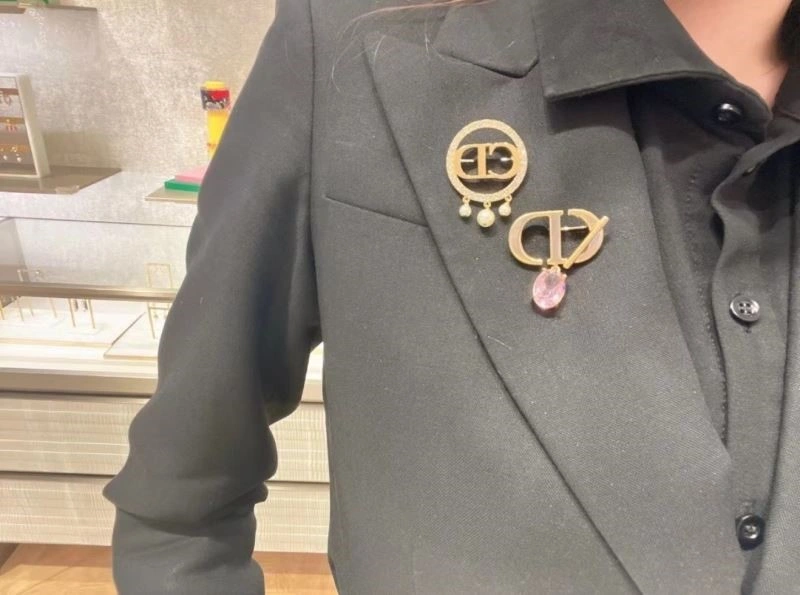 Indistinguishable Christian Dior Brooches