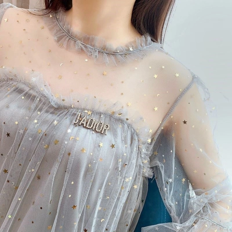 Top mirror Christian Dior Brooches