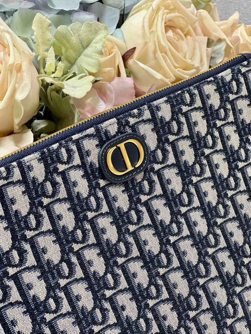 Indistinguishable Christian Dior Clutch Bags