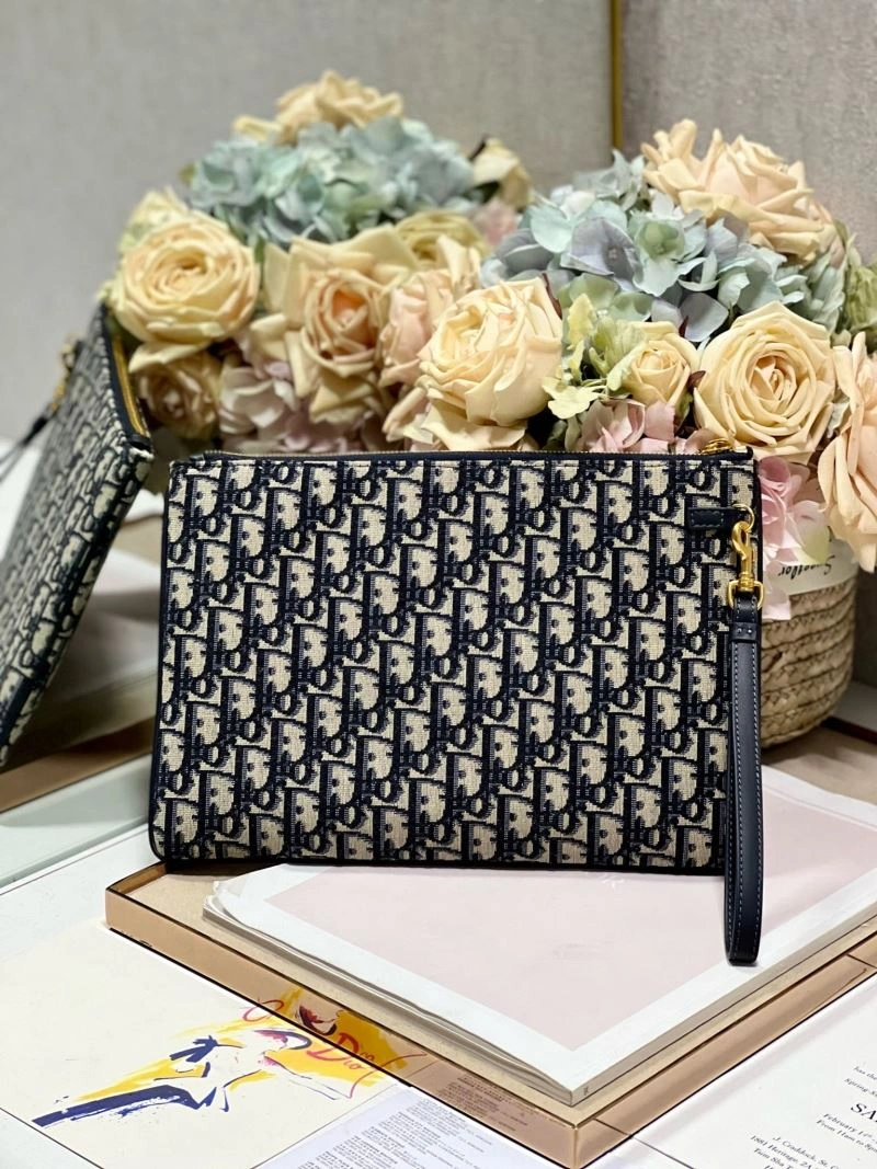 Indistinguishable Christian Dior Clutch Bags