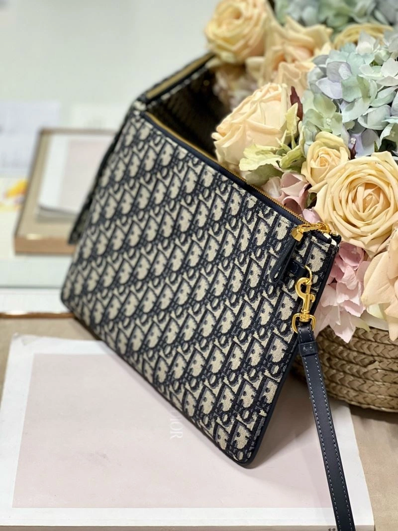 Indistinguishable Christian Dior Clutch Bags
