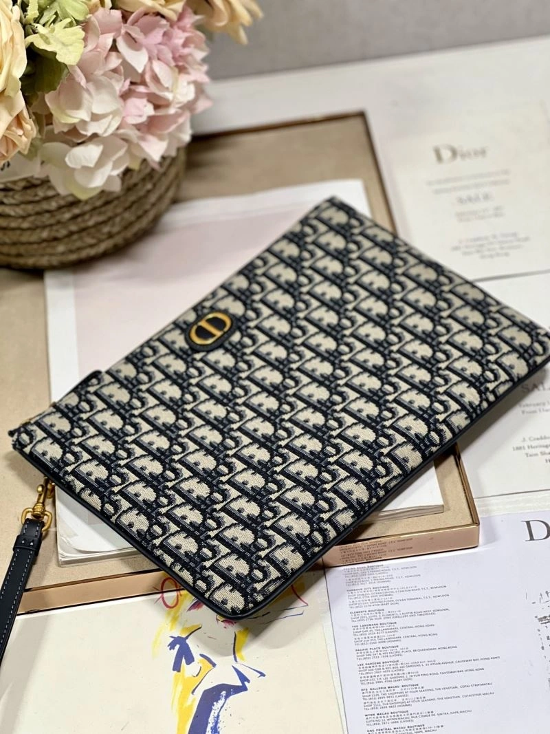 Indistinguishable Christian Dior Clutch Bags