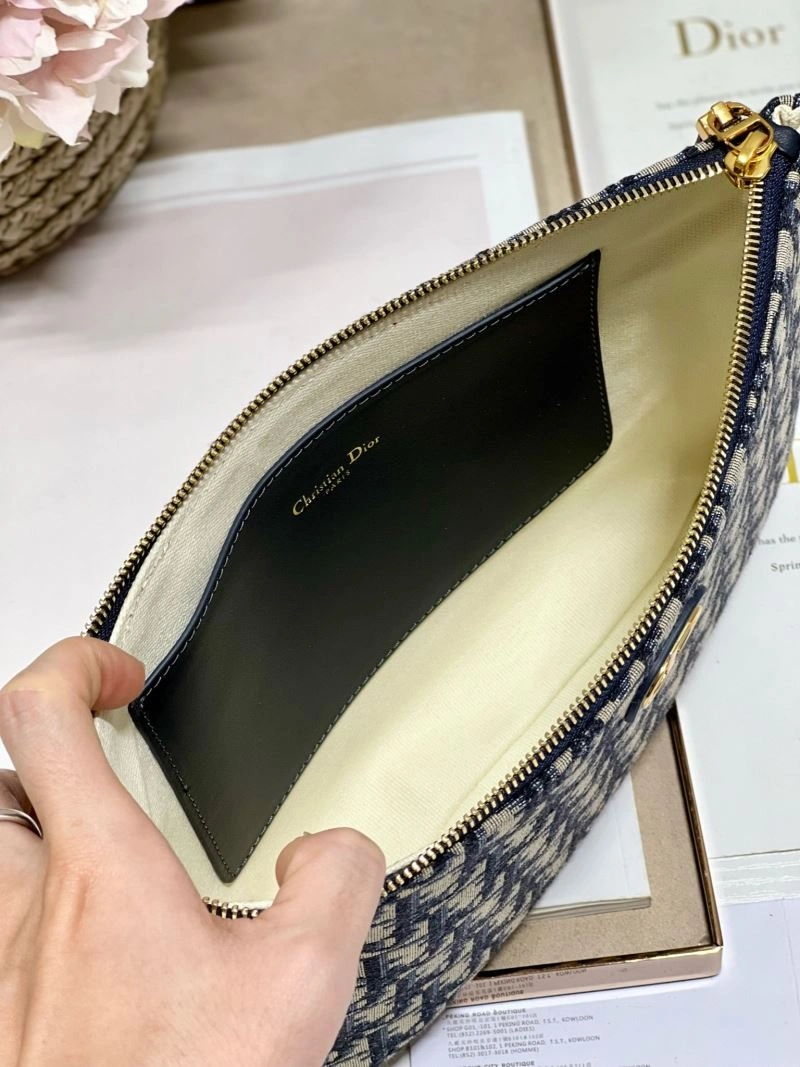 Indistinguishable Christian Dior Clutch Bags