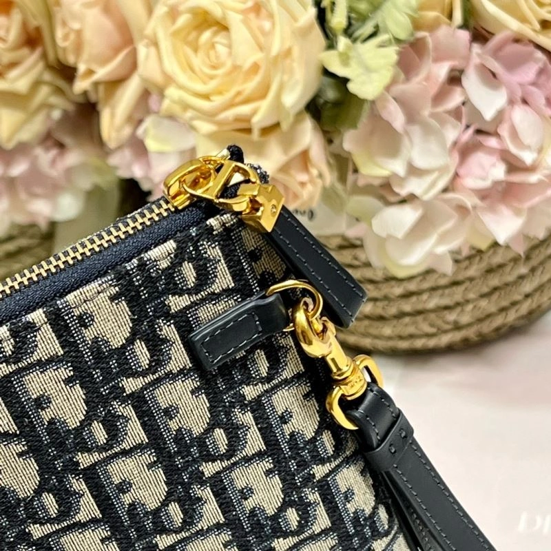 Indistinguishable Christian Dior Clutch Bags