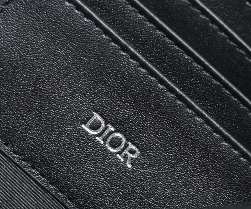 Indistinguishable Christian Dior Clutch Bags