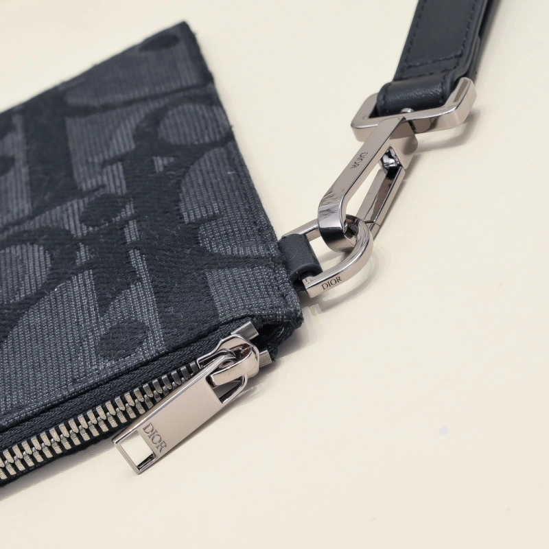 Indistinguishable Christian Dior Clutch Bags