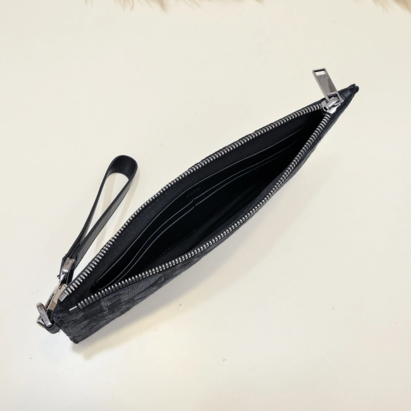 Indistinguishable Christian Dior Clutch Bags