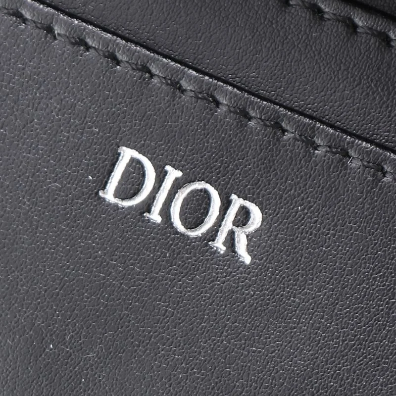 Indistinguishable Christian Dior Clutch Bags