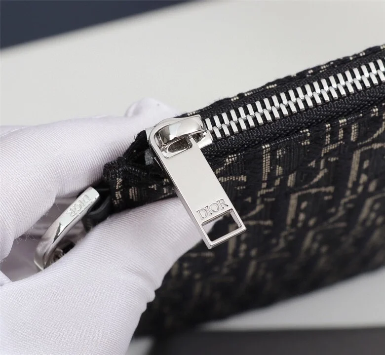 Indistinguishable Christian Dior Clutch Bags