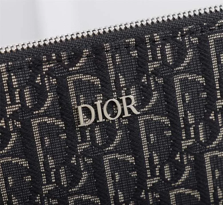 Indistinguishable Christian Dior Clutch Bags