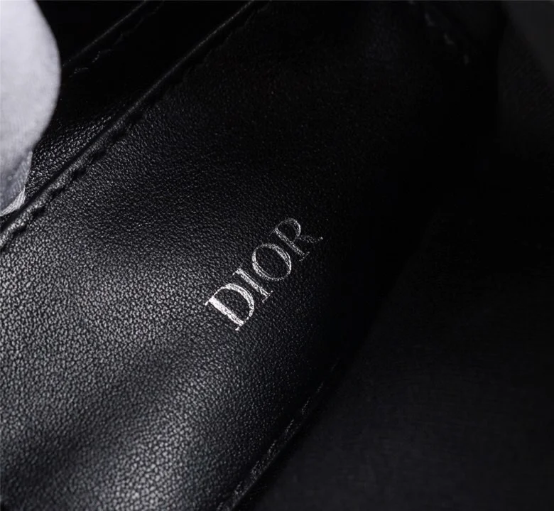 Indistinguishable Christian Dior Clutch Bags