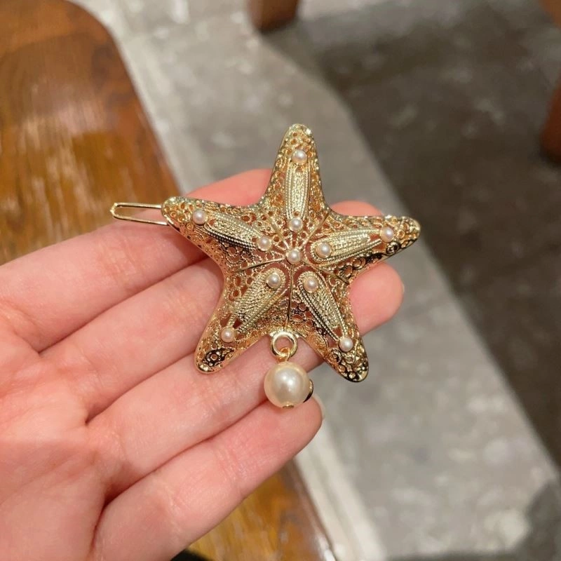 Indistinguishable Christian Dior Hairpins