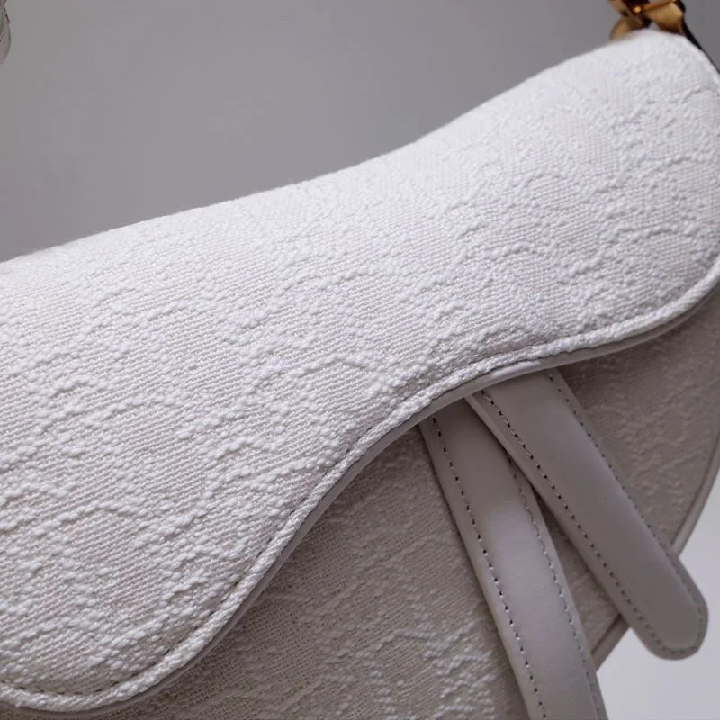 Value-priced Christian Dior Saddle bags