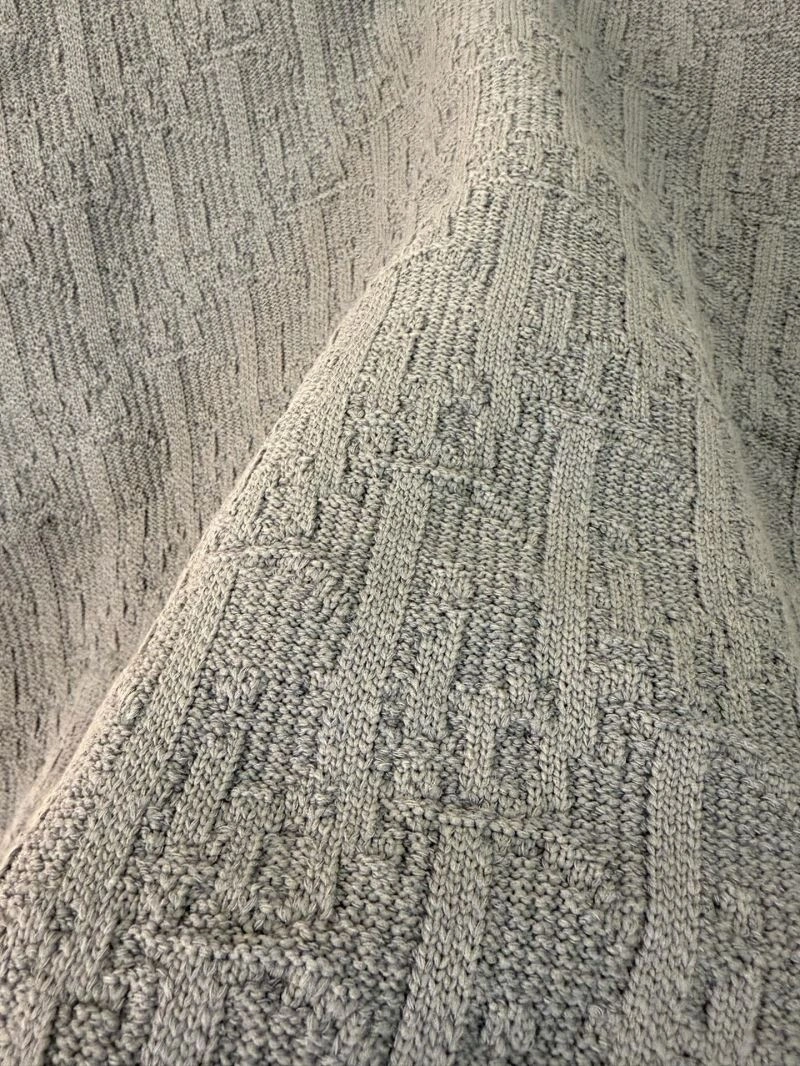 Indistinguishable Christian Dior Sweaters