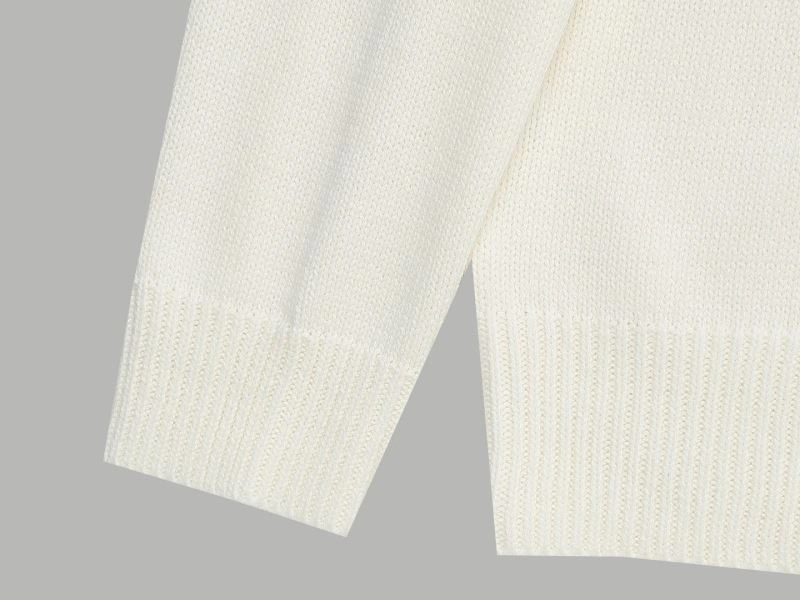 Indistinguishable Christian Dior Sweaters