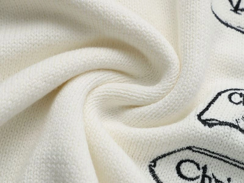 Indistinguishable Christian Dior Sweaters