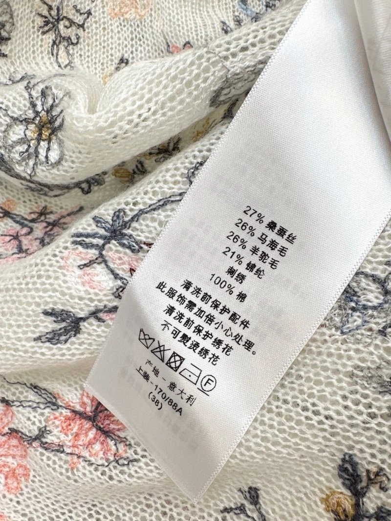 Indistinguishable Christian Dior Sweaters