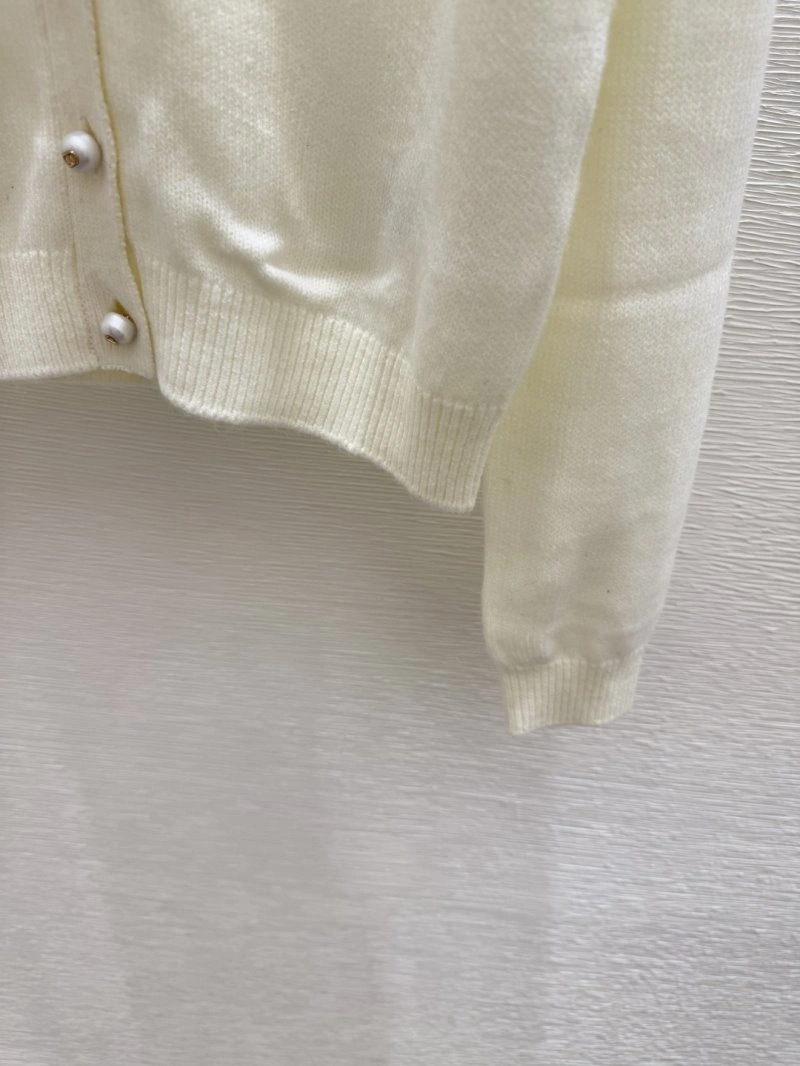 Indistinguishable Christian Dior Sweaters