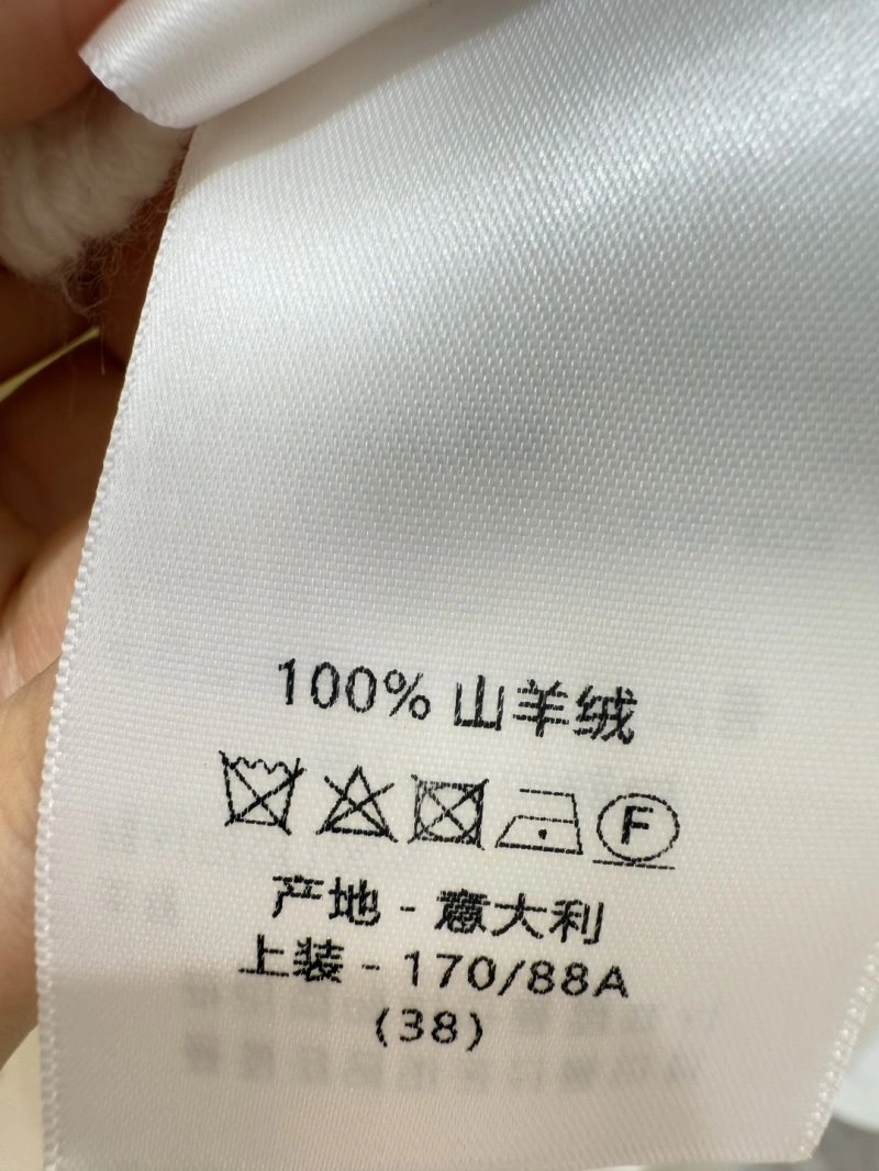 Indistinguishable Christian Dior Sweaters