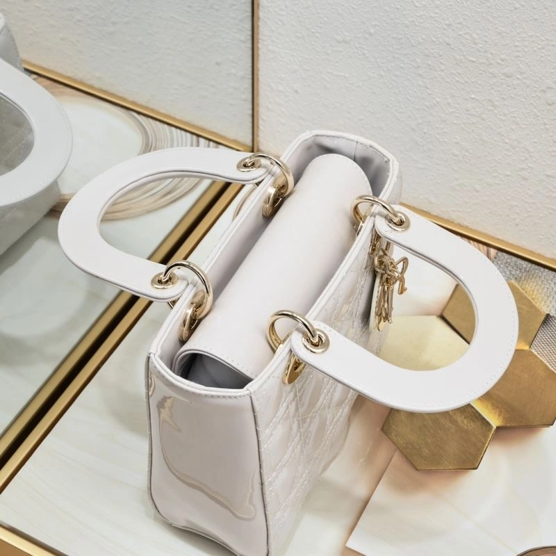 Indistinguishable Christian Dior Top Handle Bags