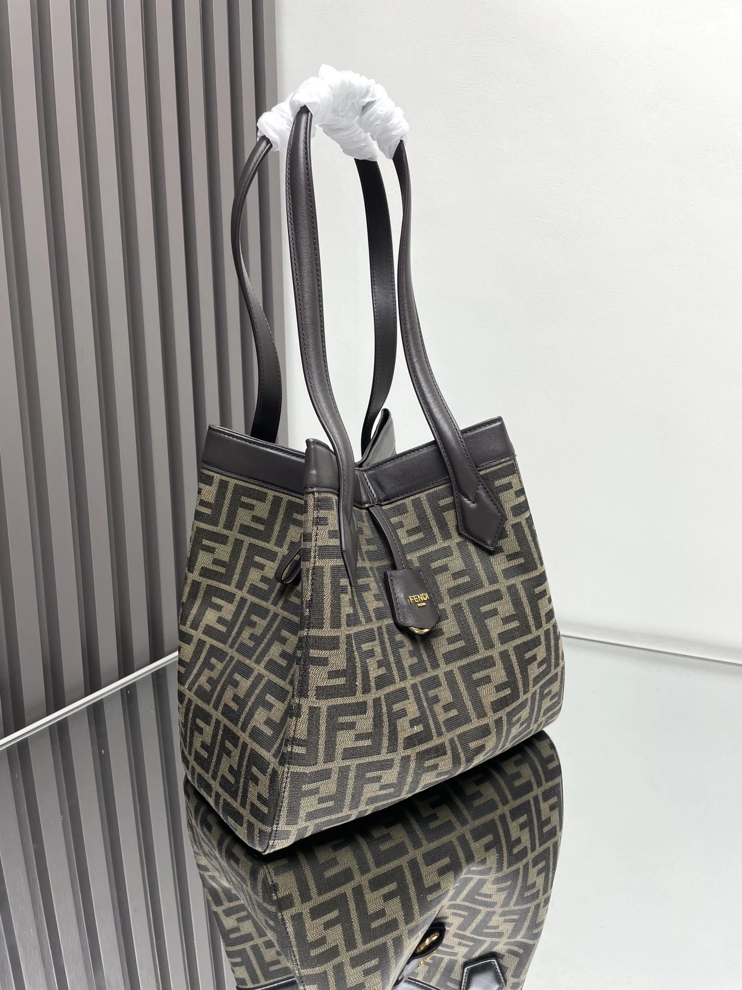 Indistinguishable Fendi Bucket Bags