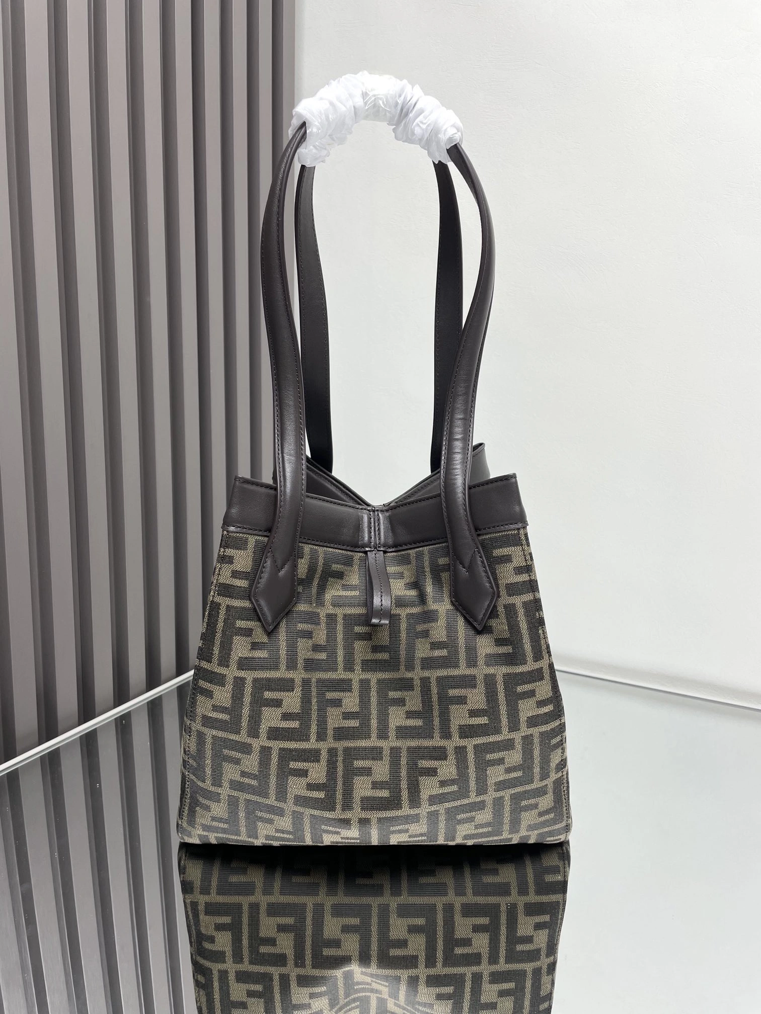 Indistinguishable Fendi Bucket Bags