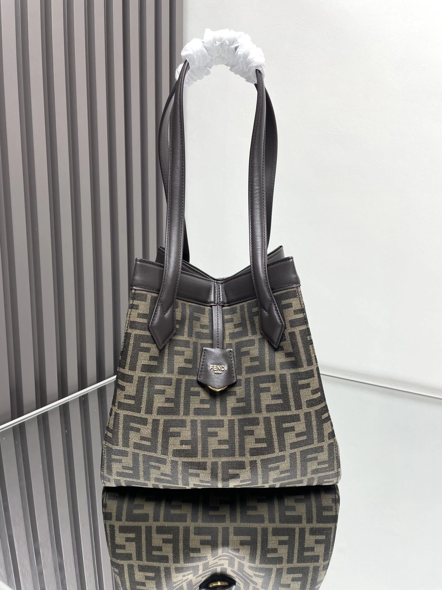 Indistinguishable Fendi Bucket Bags