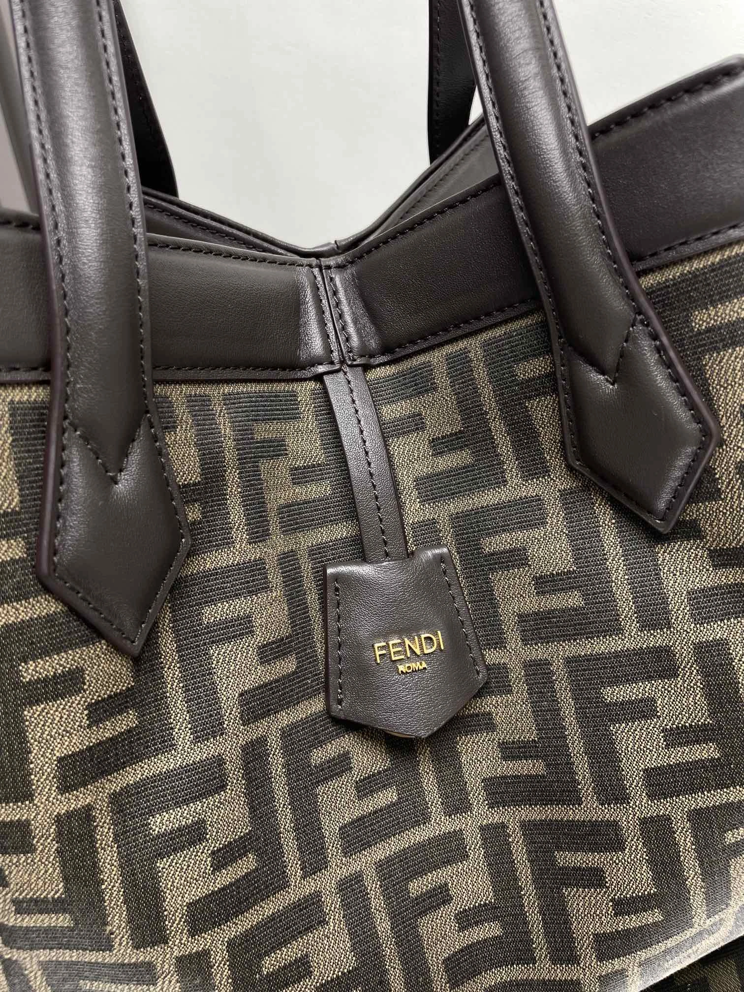 Indistinguishable Fendi Bucket Bags