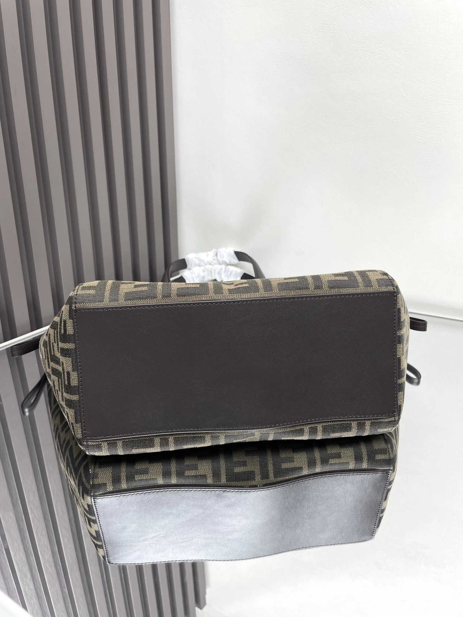 Indistinguishable Fendi Bucket Bags